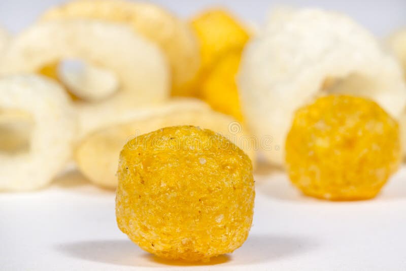 Rounded Snack in Front of Other Puffed Cereals Stock Image - Image of ...