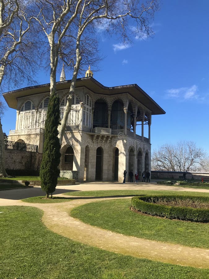 Rounded Stone Building with Arched Windows and Dome Structure Amid ...
