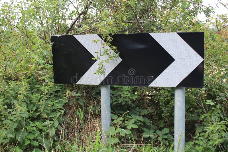 Route Deviation Road Sign at the Roadside with Wild Rose Stock Image ...