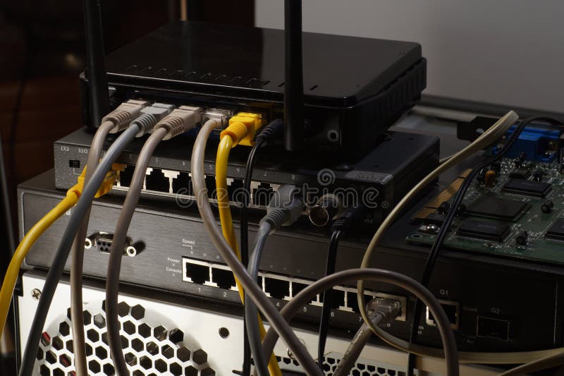 Router, Switch and Tangle of Internet Cables. PC Connections. Stock ...