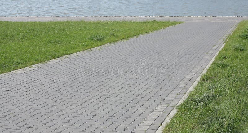 Routes on water and lawn stock photo. Image of cyclists - 33487982