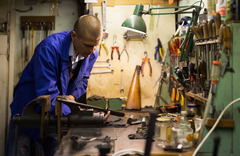 Routine Work of Gunsmith in Weapons Workshop Stock Photo - Image of ...