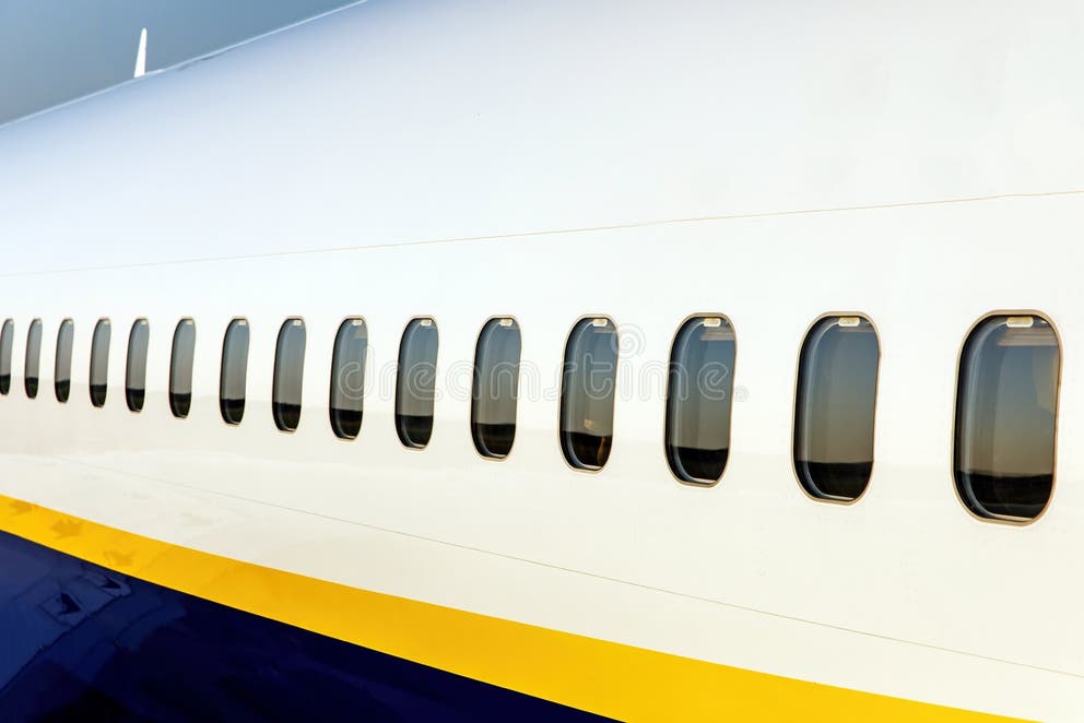 A Row of Airplane Windows, Portholes. Outside View. Stock Image - Image ...