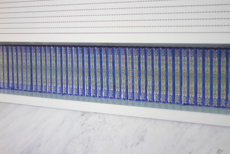 Row of Al Quran on rack stock image. Image of masjid - 45327323