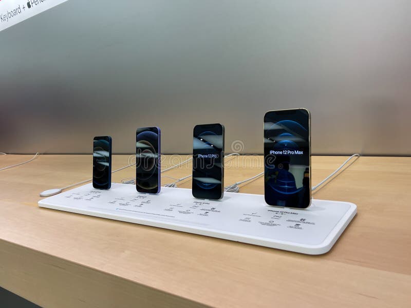 A Row of All of the Models of the IPhone 12 at an Apple Store Editorial ...