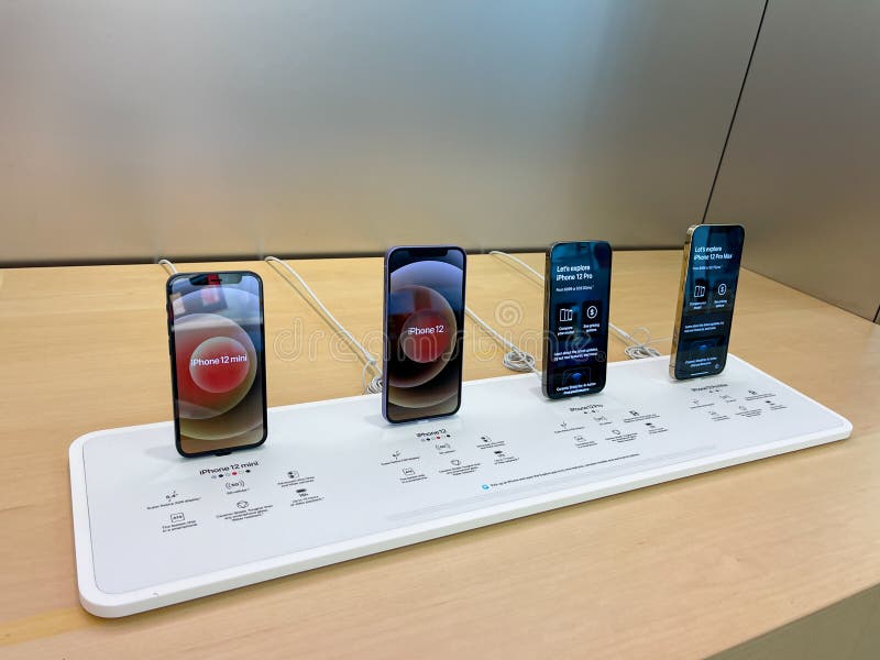 A Row of All of the Models of the IPhone 12 at an Apple Store Editorial ...