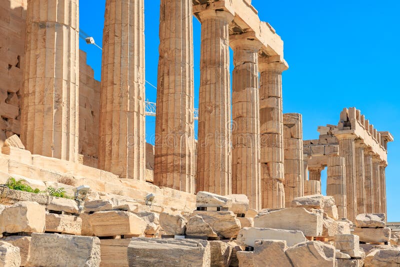 A Row of Ancient Greek Columns, with Some of Them Being Partially ...