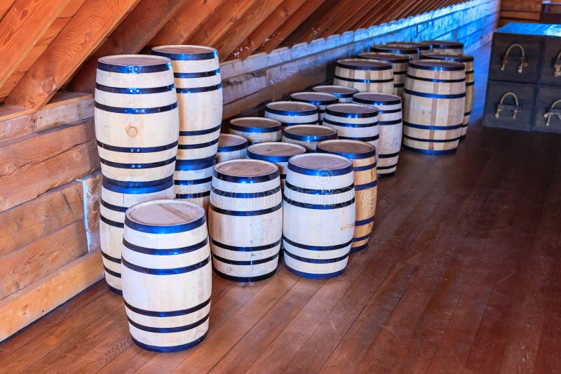 A Row of Barrels are Stacked on Top of Each Other Stock Photo - Image ...