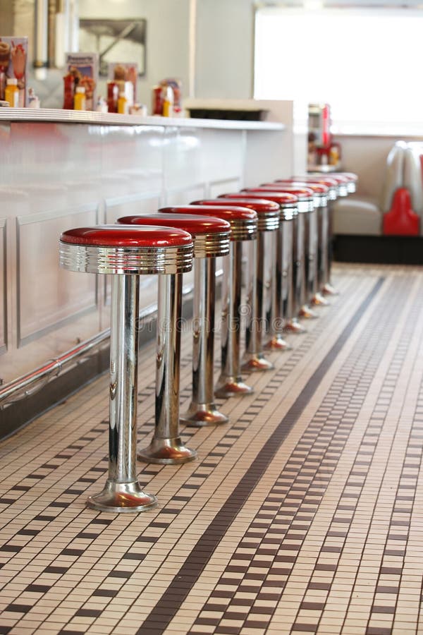 Bar Stools in a Fifties Style Diner. Stock Photo - Image of floor, rows ...