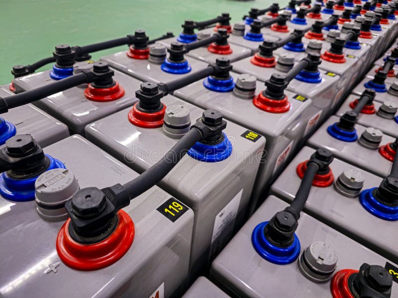 A Row of Batteries with Red, Blue, and White Caps Stock Photo - Image ...