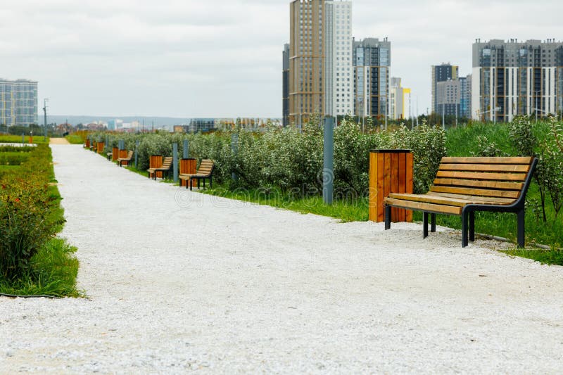 A Row of Benches in the City Park Stock Image - Image of vacation ...