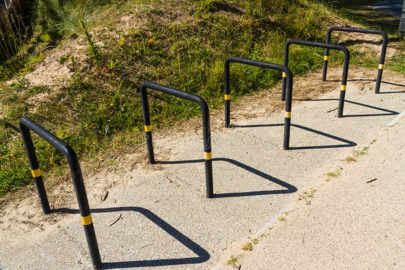 Row of bicycle bike racks stock image. Image of curve - 68899787