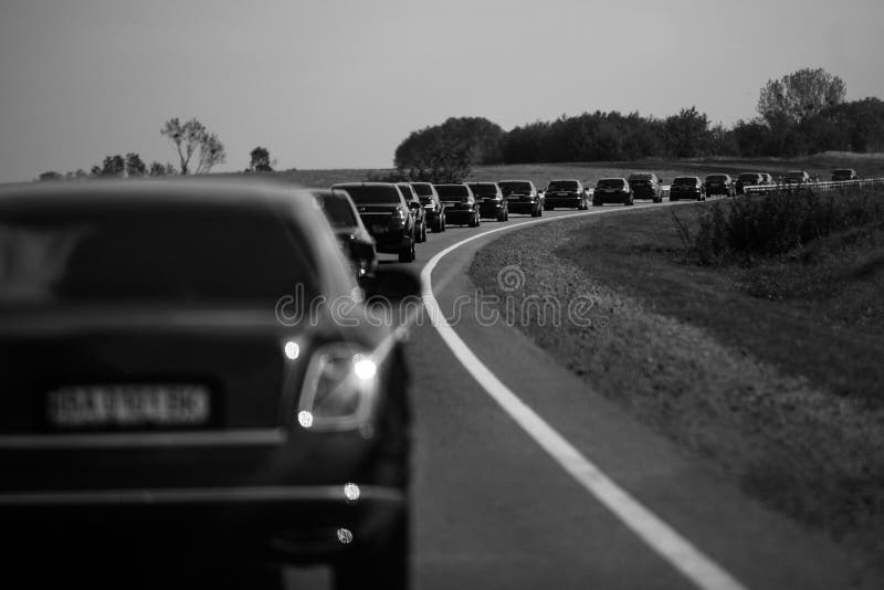 Row of Black Cars on the Road. Wedding Procession Stock Photo - Image ...