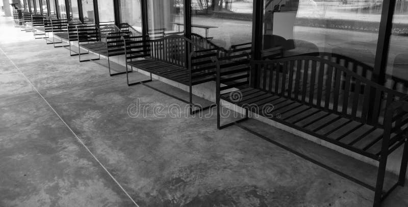 Row of Black Metal Bench on the Patio Stock Image - Image of furniture ...