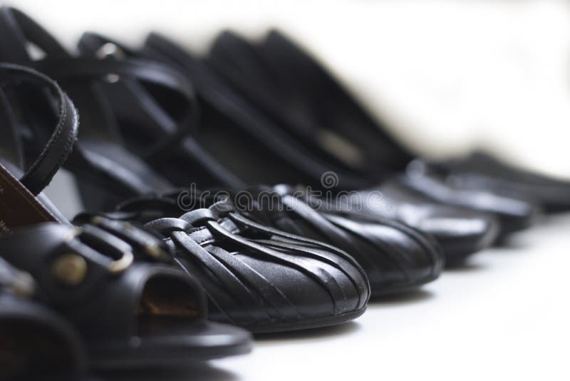 Row of Black Shoes stock image. Image of garment, luxury - 2962261