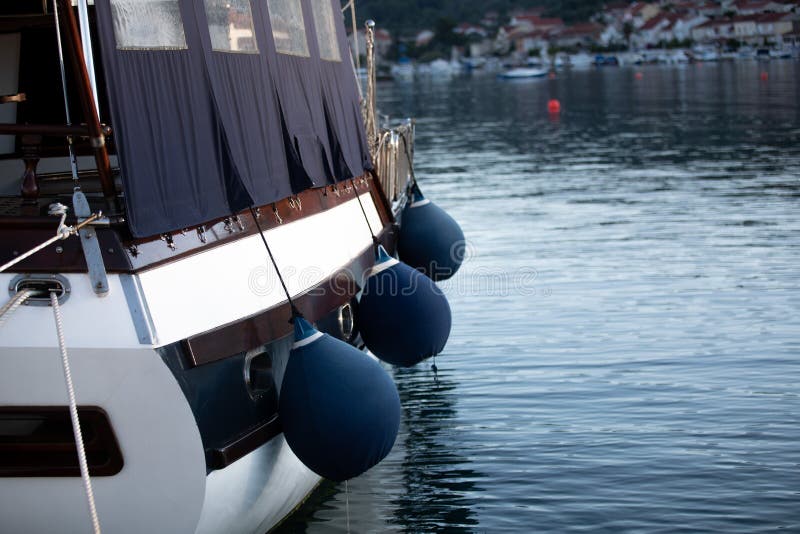 Row of Blue Buoys on the Side of a Boat Stock Image - Image of ship ...
