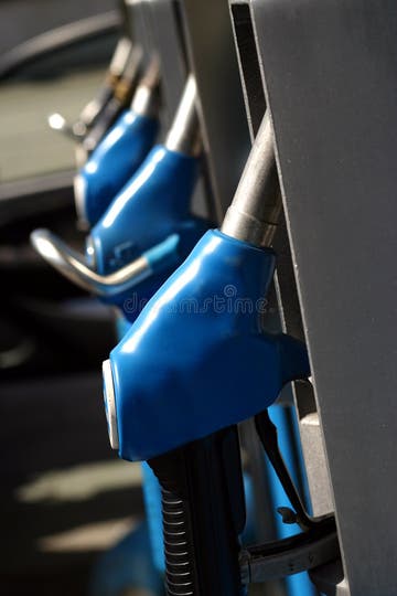 Row of Blue Gas Pump Nozzles Stock Photo - Image of nozzle, pumps: 2304144