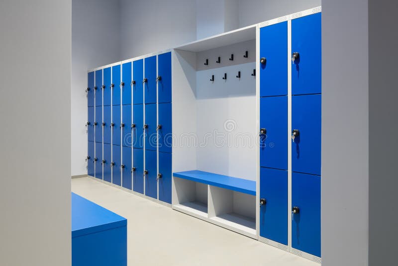 Blue Lockers on a Wall with Key in a Lock and a Bench Stock Image ...