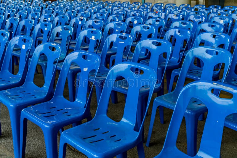 Blue plastic chairs stock photo. Image of outdoor, chair - 115506222