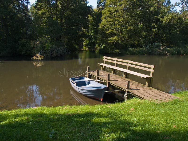 Row Boat in a Beautiful River Stock Image - Image of tranquil, lonely ...