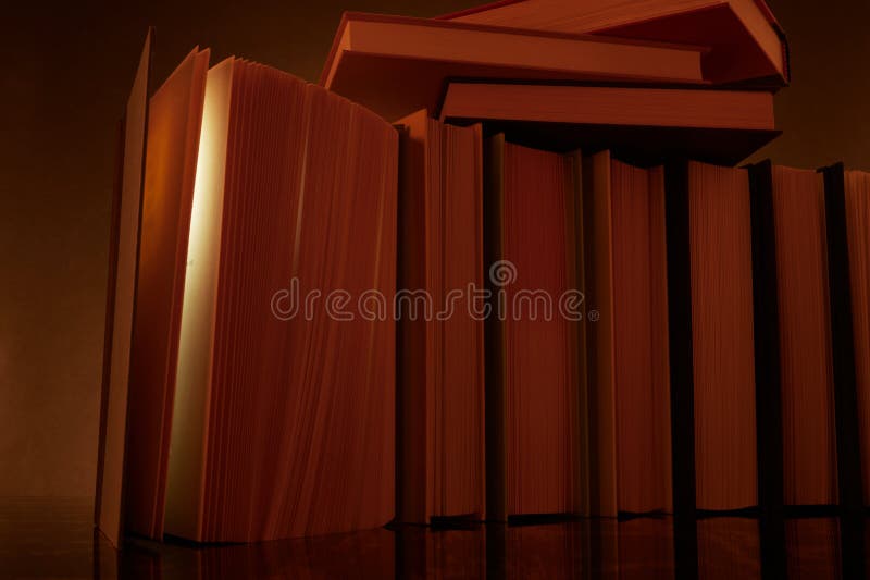 Row of Books Glowing with Knowledge Stock Image - Image of read, light ...
