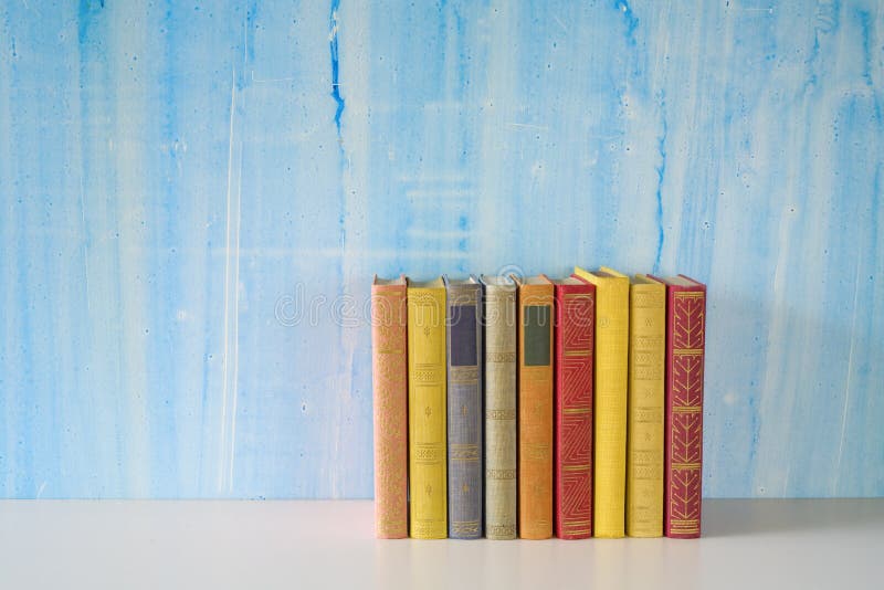 Row Of Books,blue Background Stock Image - Image of interior, bookshelf ...