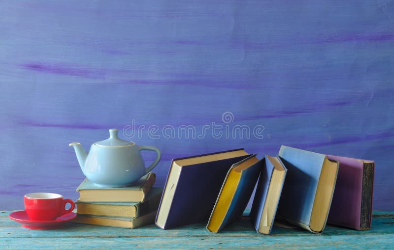 Row of Books with Open Book and Cup of Espresso Coffee, Reading ...