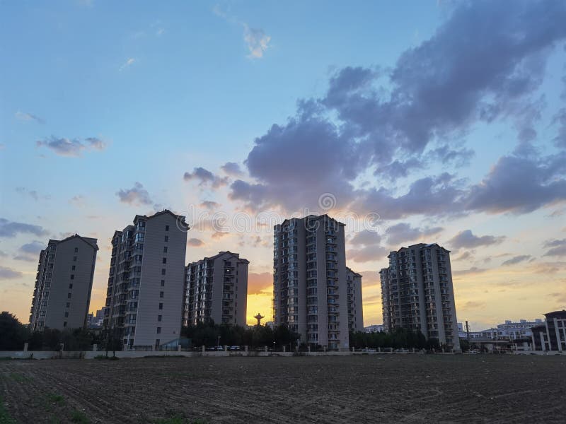 A Row of Buildings at Sunset Editorial Photography - Image of evening ...