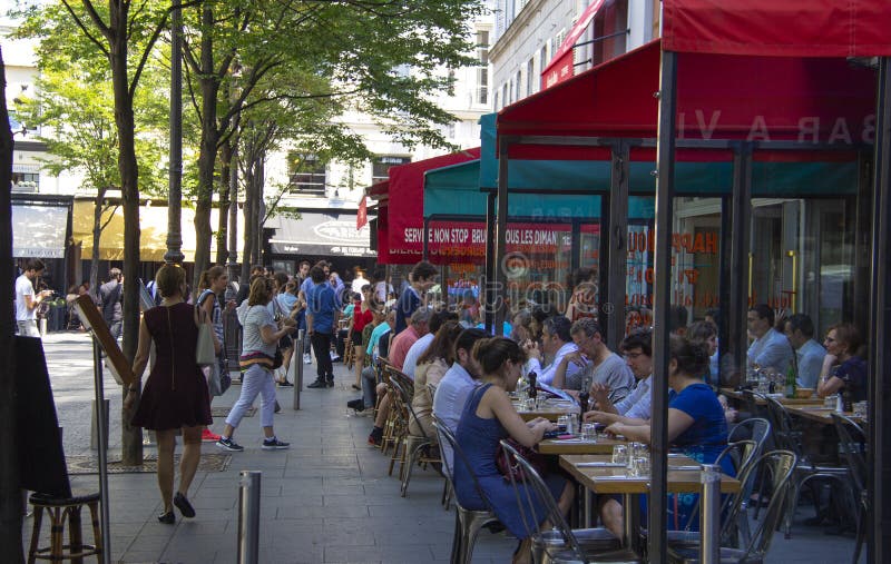 Busy Paris Street Scene in Front of Le Cafe Conti Editorial Stock Image ...