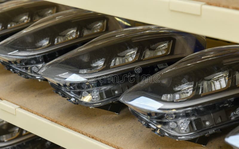 Row of Car Headlights at the Factory Stock Image - Image of headlight ...