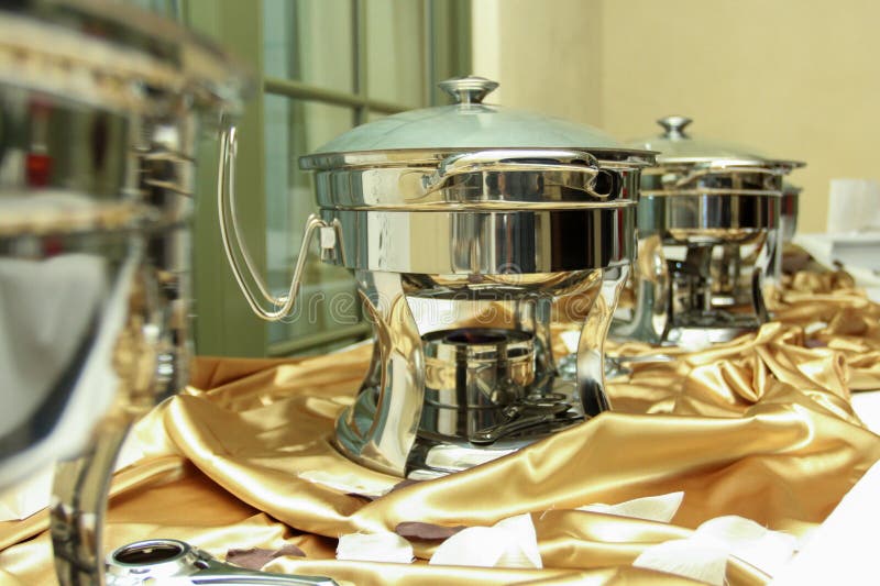 Row of chafing Dishes stock photo. Image of sterno, self - 310176646