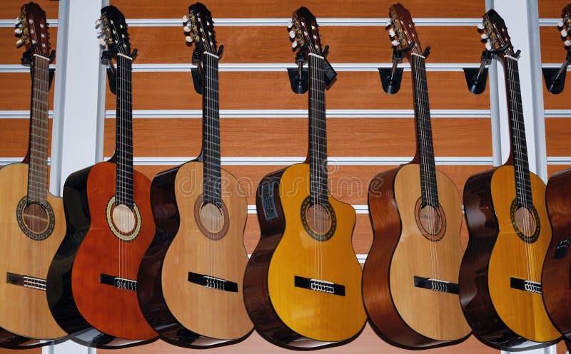 Row Of Classical Acoustic Guitars Stock Image - Image of display ...