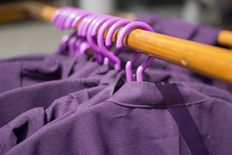 Row of Cloth Hangers with Coats Stock Image - Image of clothes, apparel ...
