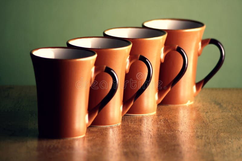 Row of coffee mugs stock photo. Image of wood, ceramic - 48480388