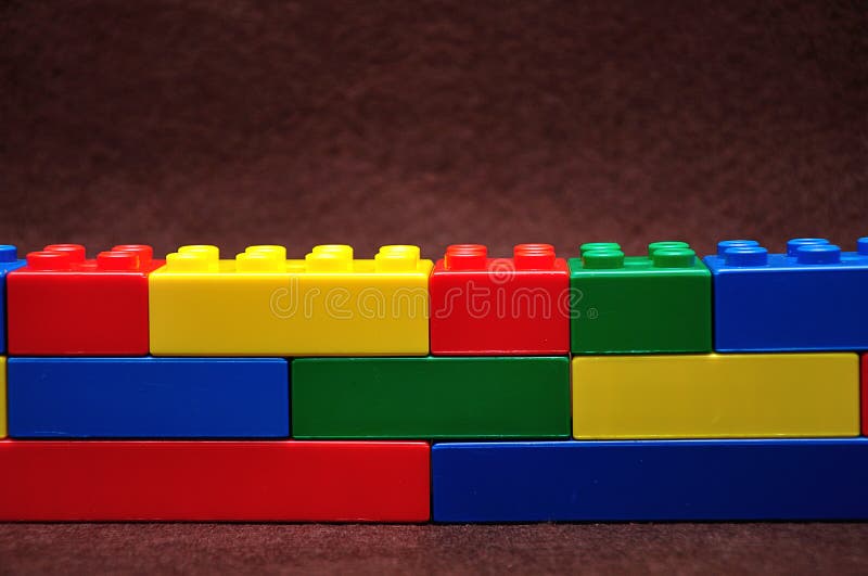 Row of Color Building Blocks Built As a Wall Stock Image - Image of ...