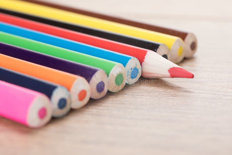 Single Red Crayon is Sticking Out of the Gray Row Stock Photo - Image ...