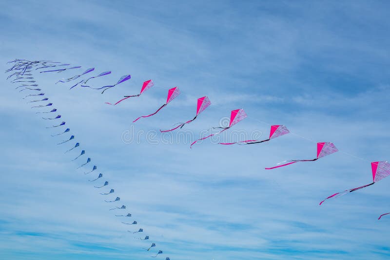A Row of Colored Kites in the Sky Stock Photo - Image of festival ...