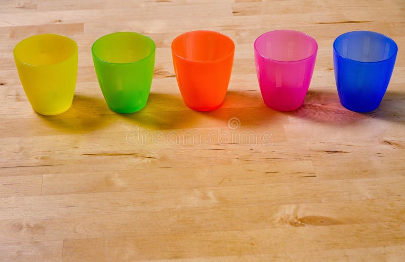 Row of Colorful Plastic Cups Stock Image - Image of arrangement, clean ...