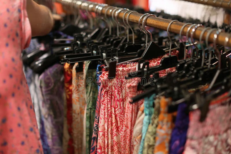 Row of Colorful Things Hanging on the Hanger Stock Photo - Image of ...