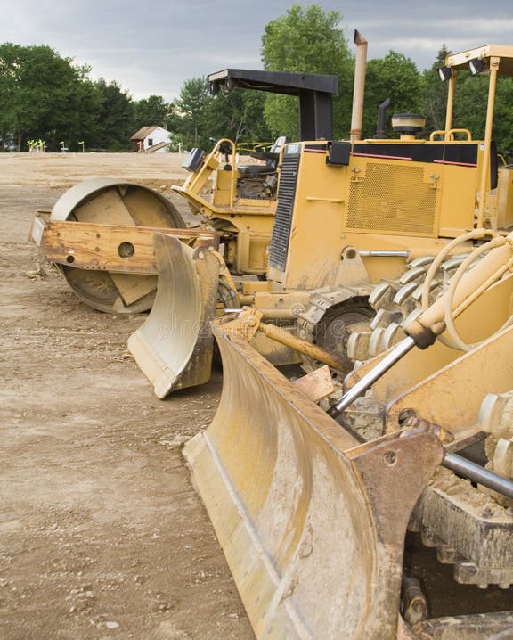 Row of Construction Equipment Stock Image - Image of excavator, case ...