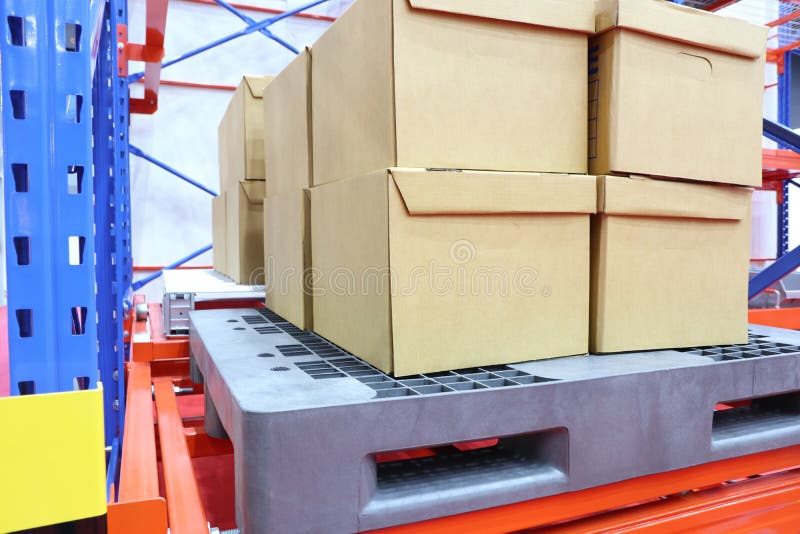 Row of Cotton Boxes Kept in Warehouse Shelves Stock Photo - Image of ...