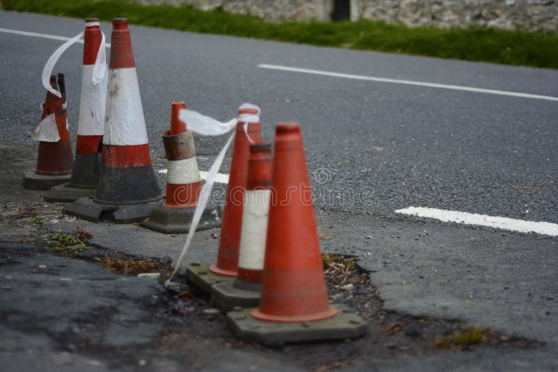 A Row of Damaged Traffic Cones Stock Image - Image of sitting, traffic ...