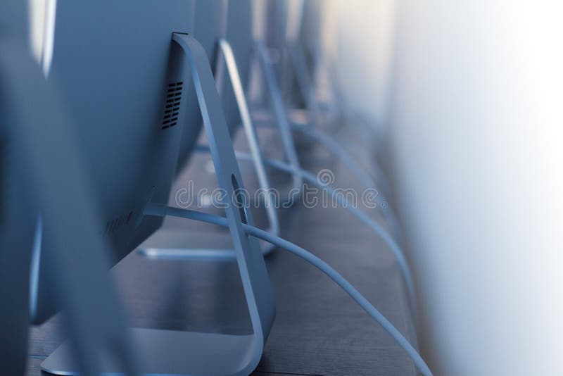 Row of Desktop Computers with Cables on Desk Stock Photo - Image of ...