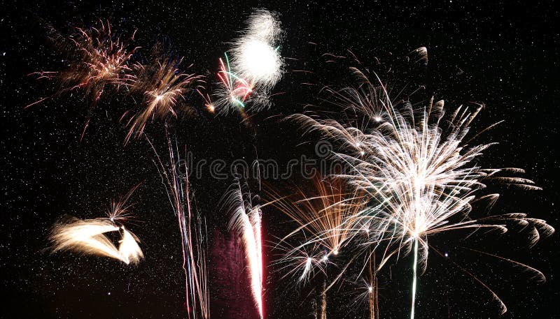 Row of Different Fireworks in Front of Starry Sky Stock Photo - Image ...