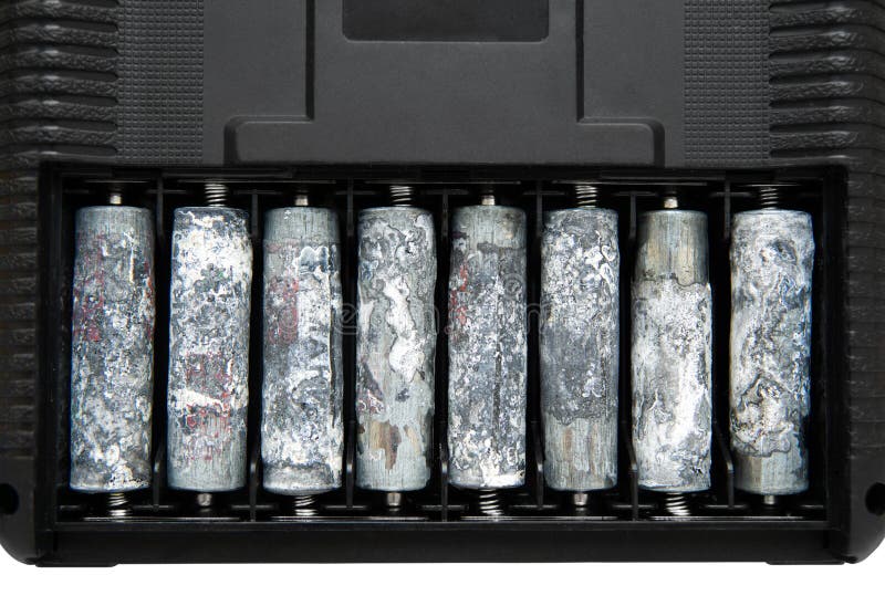 A Row of Eight Unwrapped and Heavily Oxidized AA Batteries Inside the ...