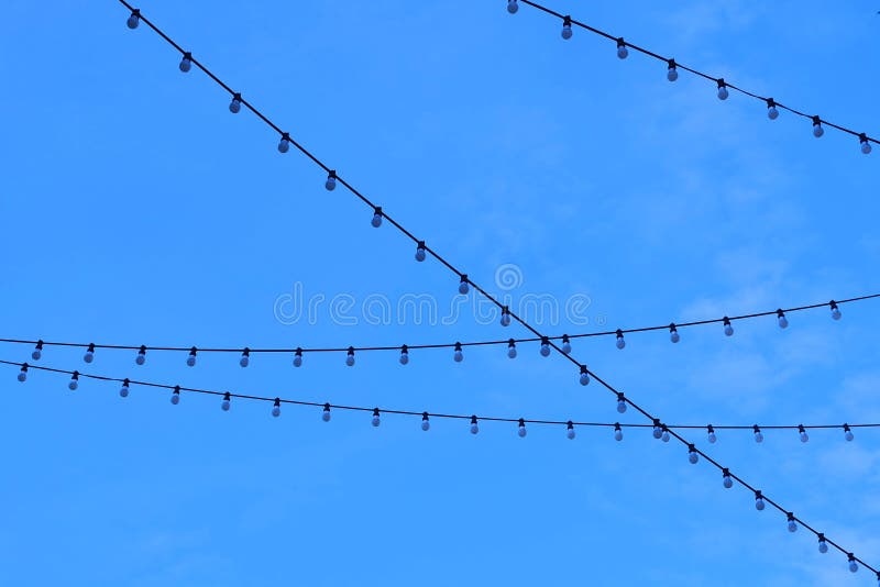 Many Light Bulbs Hanging on the Wire Stock Photo - Image of lamp ...