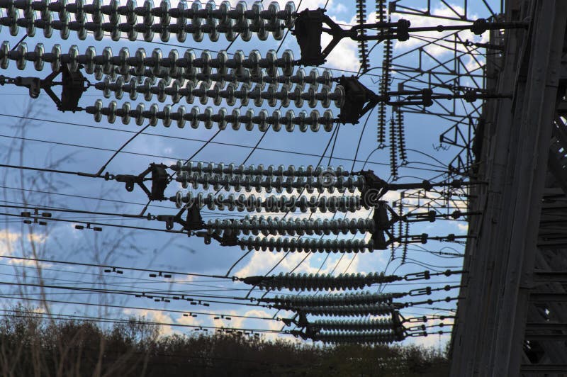 The row of electric pylons stock photo. Image of performance - 131449780