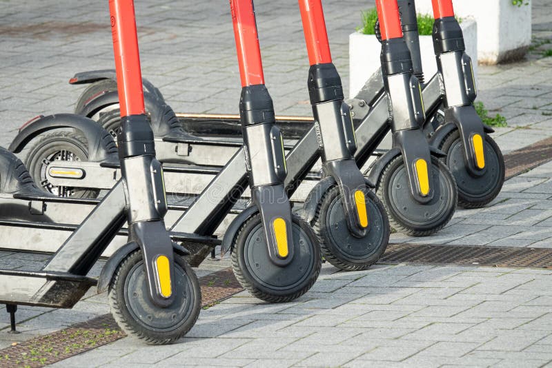 Row of Electric Scooters for Public Share. Electric Urban ...