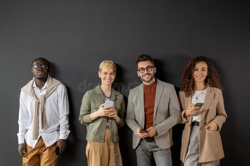 Row of Elegant People with Smartphones Stock Image - Image of ...