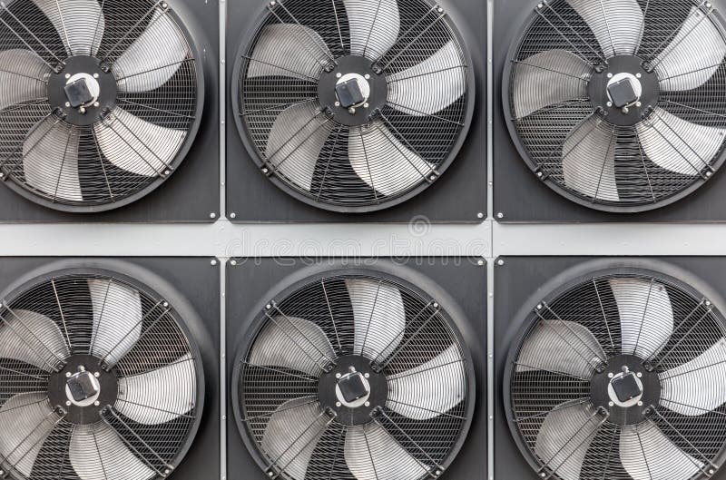 A Row of Fans are Mounted on a Wall Stock Photo - Image of equipment ...